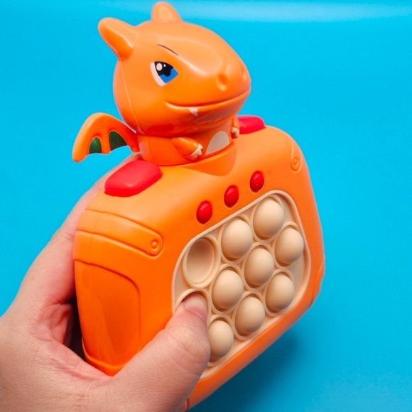 Mochiland | Toys | 2 Pokemon Dragon Charizard Light Up Popit Game Quick ...